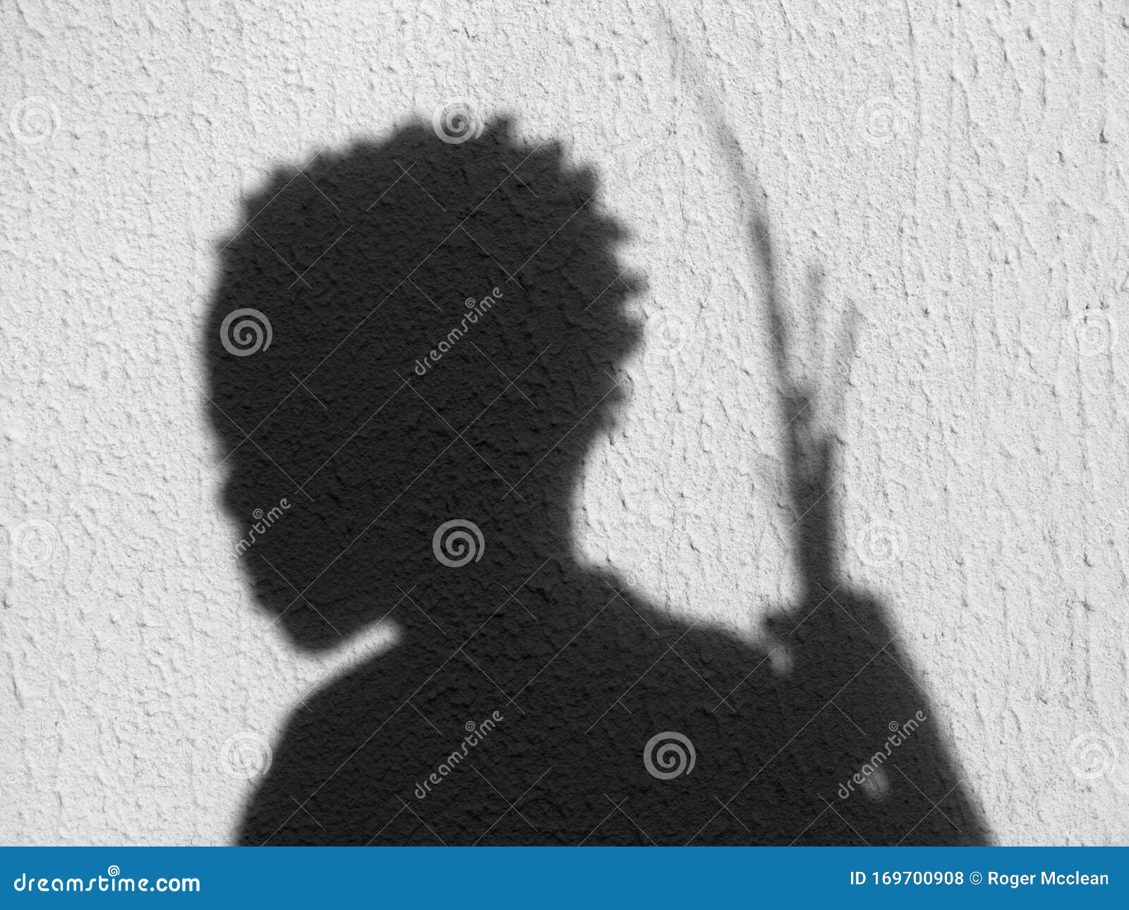 Shadow of a Boy Holding Sticks on Stone Stock Photo - Image of portrait ...