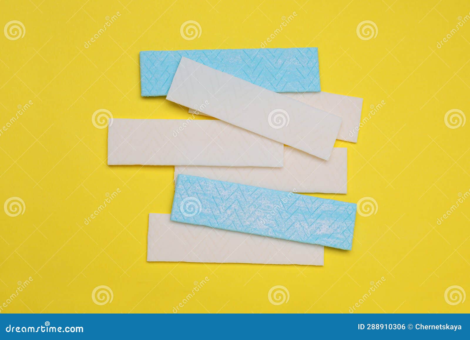 Sticks of Tasty Chewing Gum on Yellow Background, Flat Lay Stock Photo ...