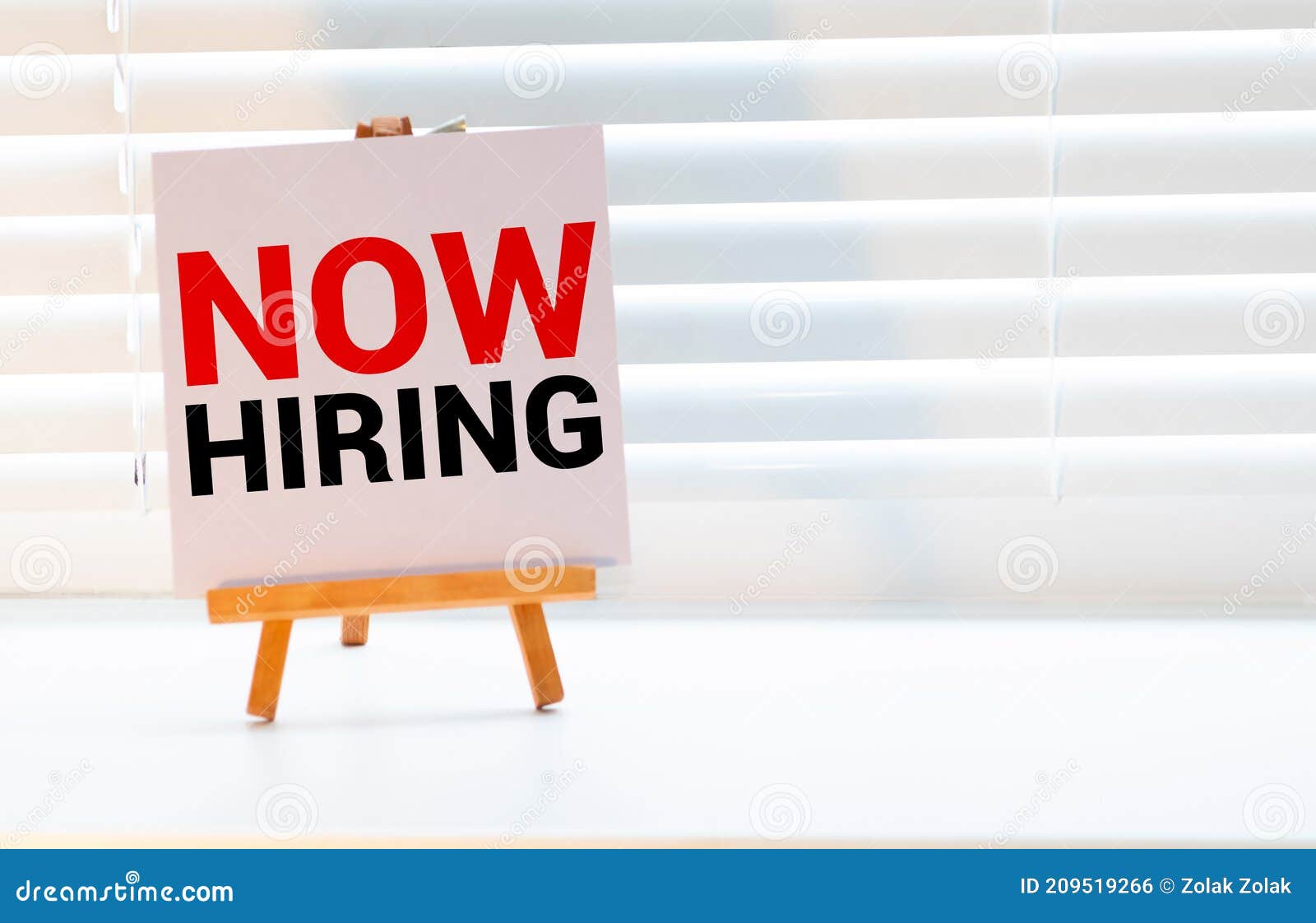 A Sticky Note on a Cork Board with the Words Now Hiring on it Stock ... A Sticky Note on a Cork Board with the Words Now Hiring on it Stock ...
