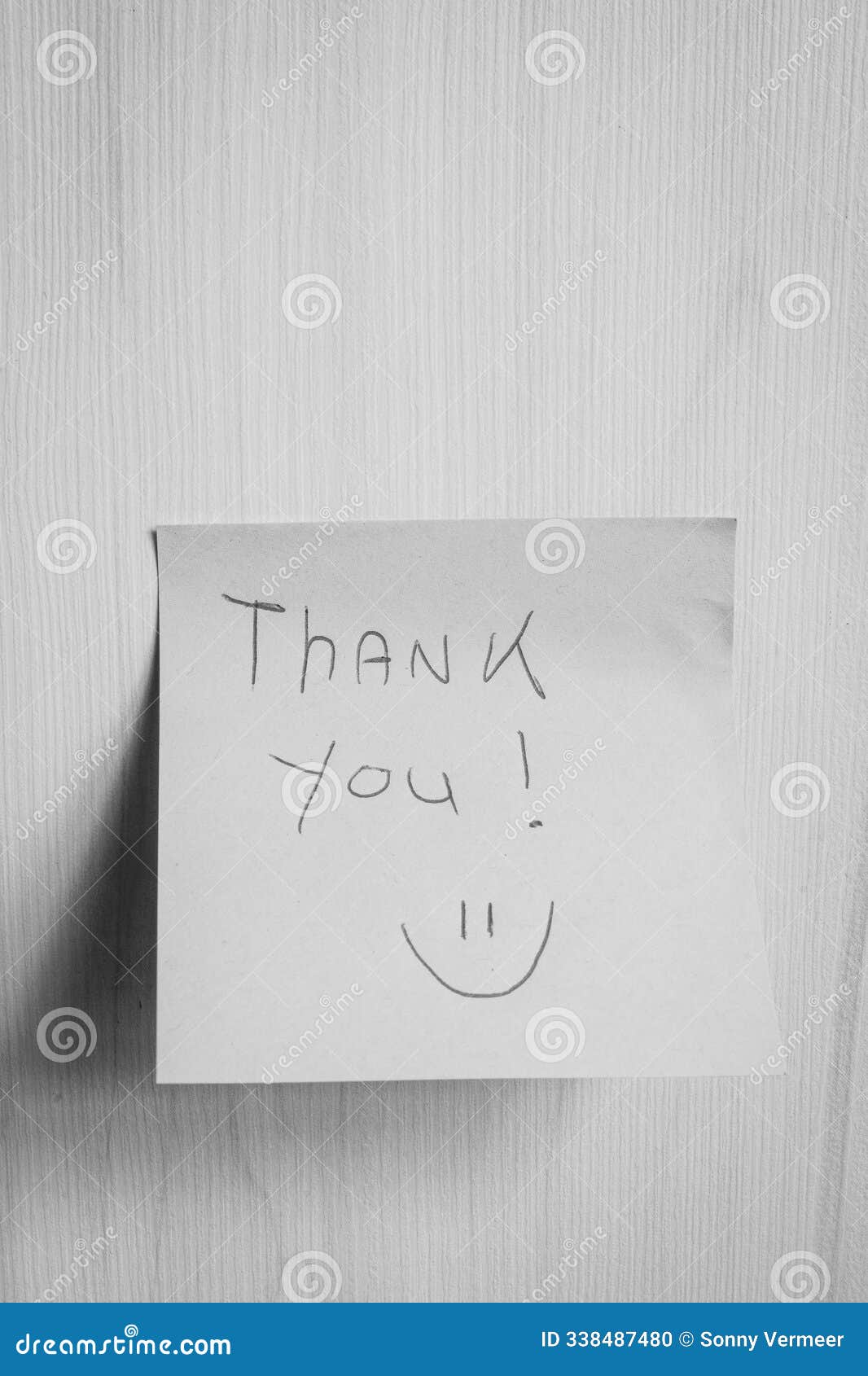 A Sticky Note Hanging on the Wall, with the Text Thank You on it Stock ...