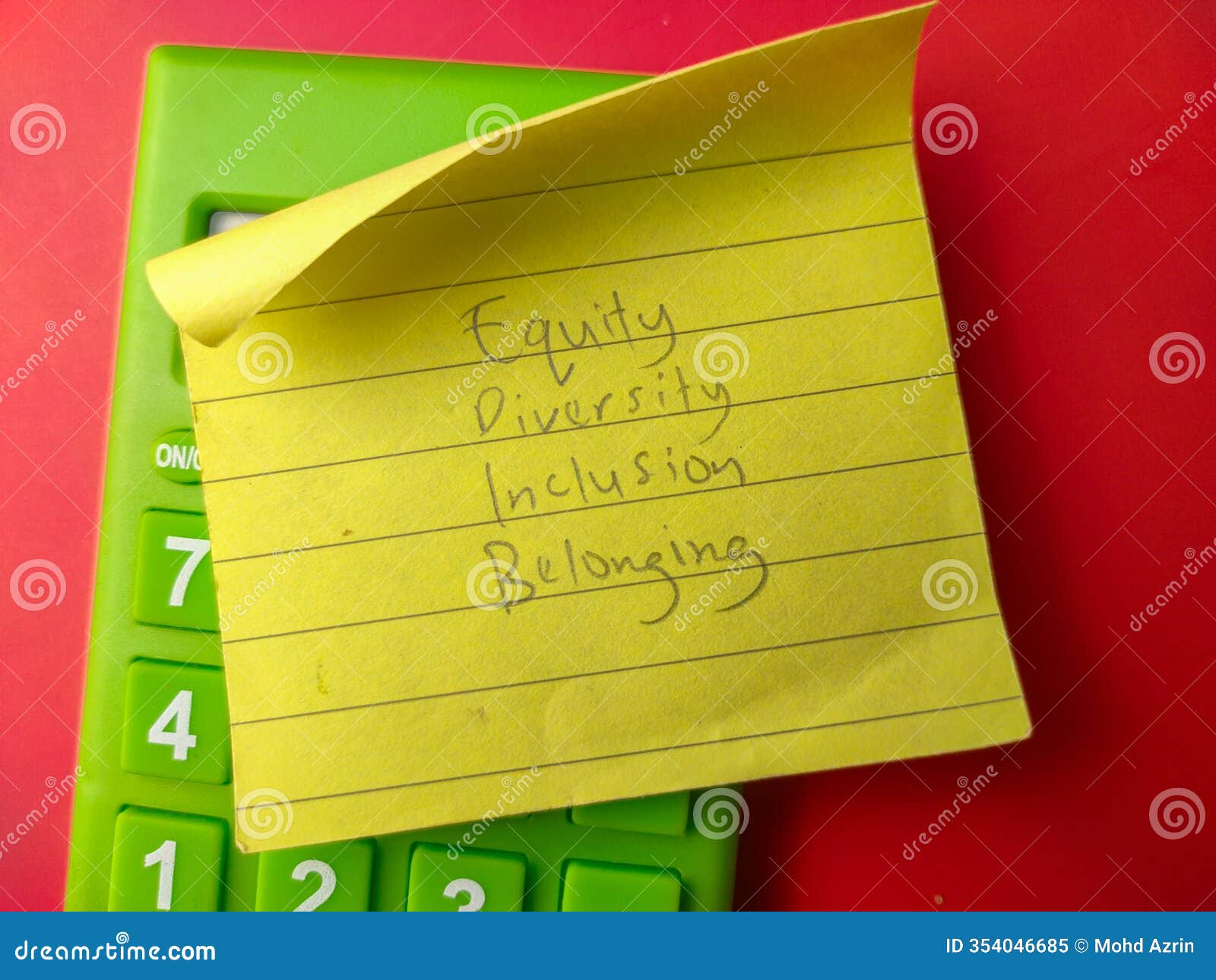 Sticky Note with the Word Equity Diversity Inclusion Belonging on a Red ...
