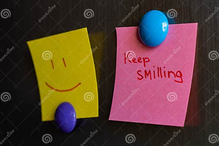 Sticky Notes Keep Smiling and Smiley Magnet Attached To the ...