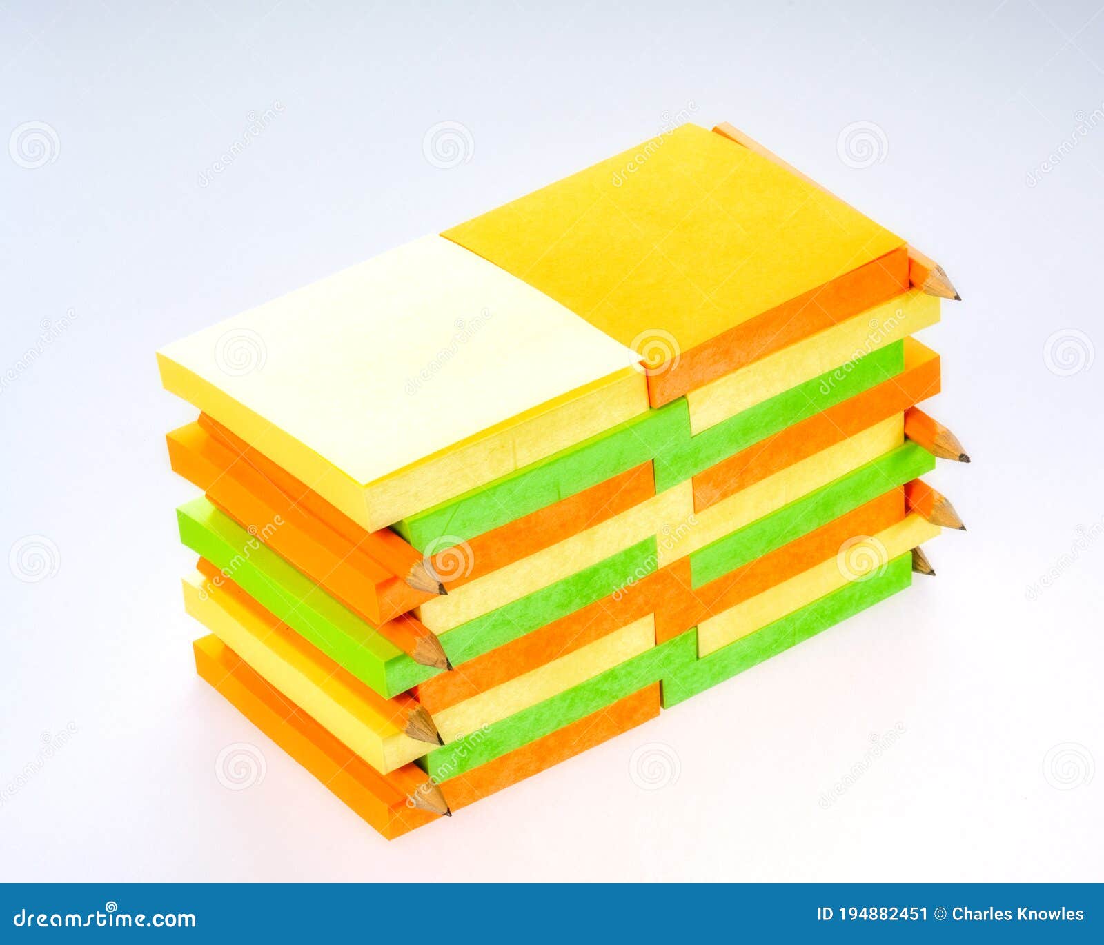 Sticky Notes Stacked in a Pattern with Little Pencils Stock Image ...