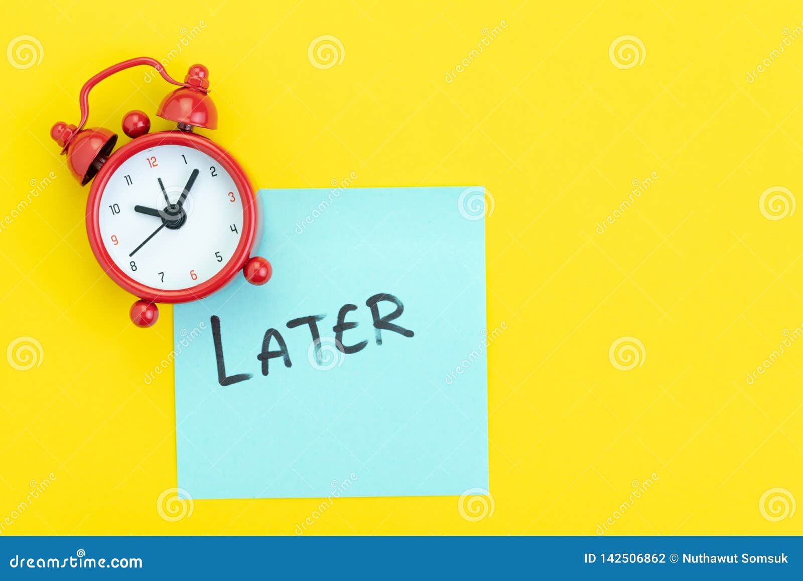 Sticky Post with Handwriting the Word Later with Small Alarm Clock on ...