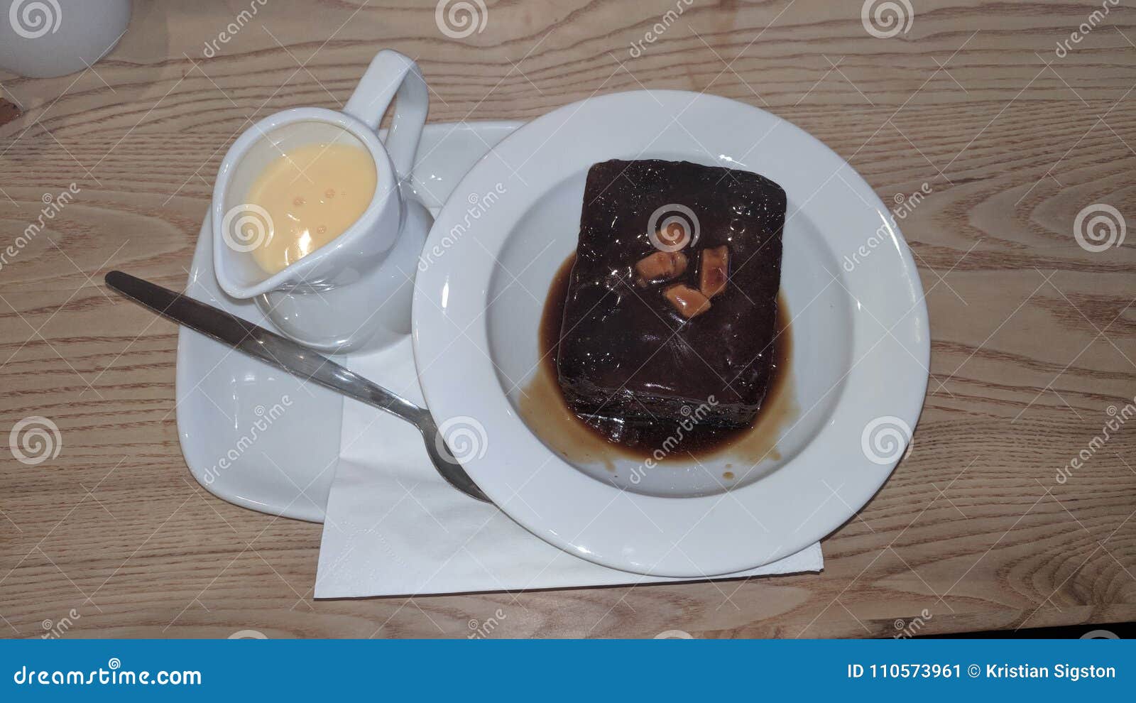 Sticky Toffee Pudding with Custard Stock Image - Image of spoon, toffee ...