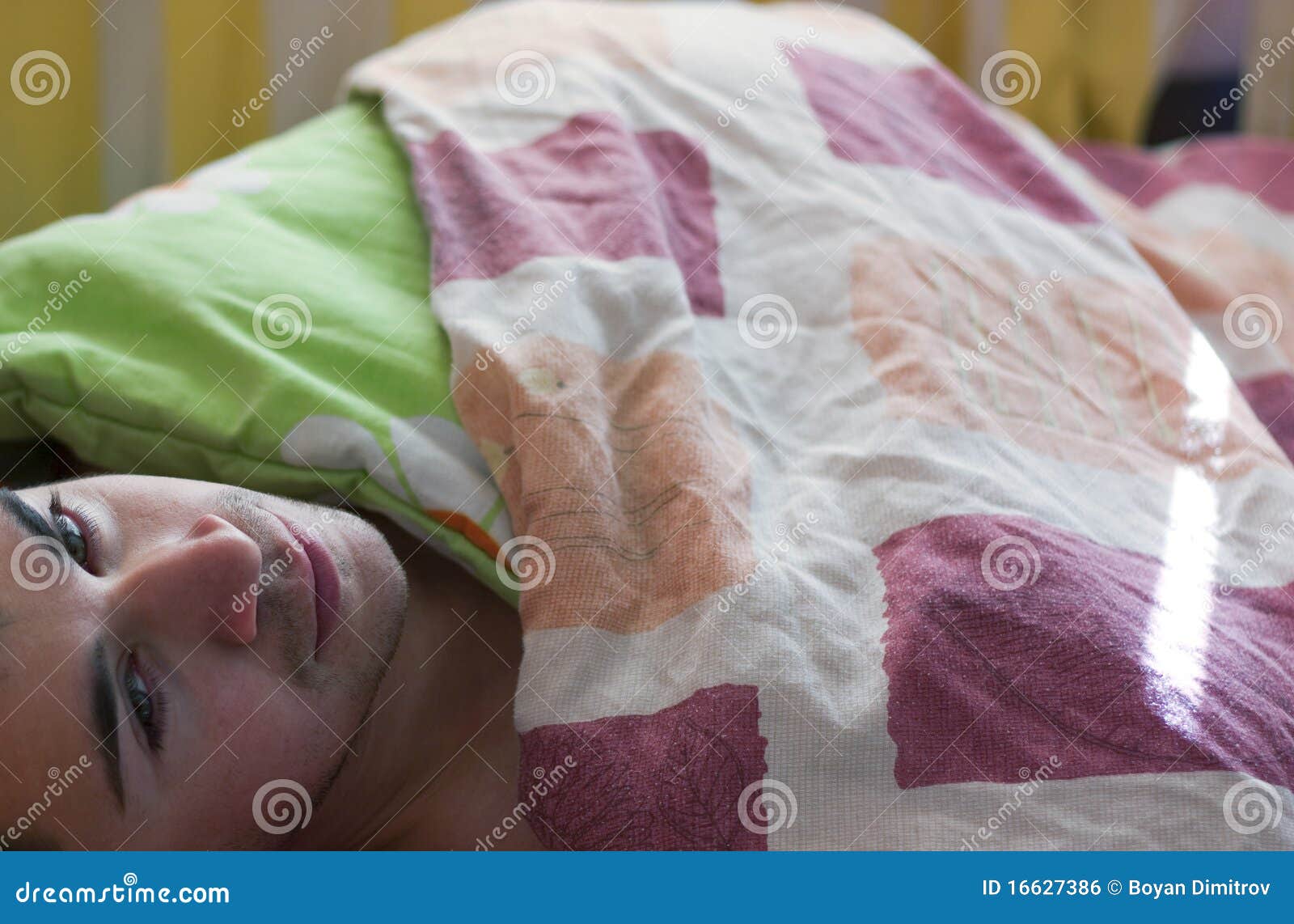 Still in bed stock photo. Image of indoors, handsome - 16627386