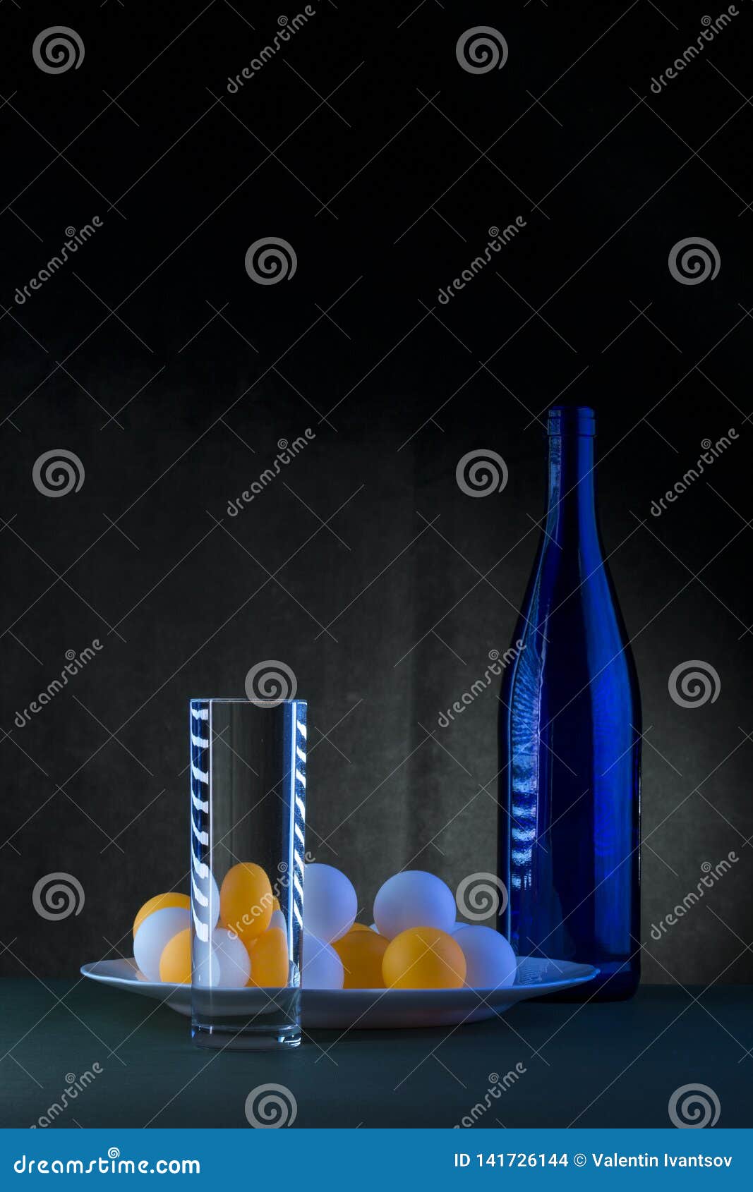 Still Life with Blue Bottle and Balls Stock Photo - Image of ...