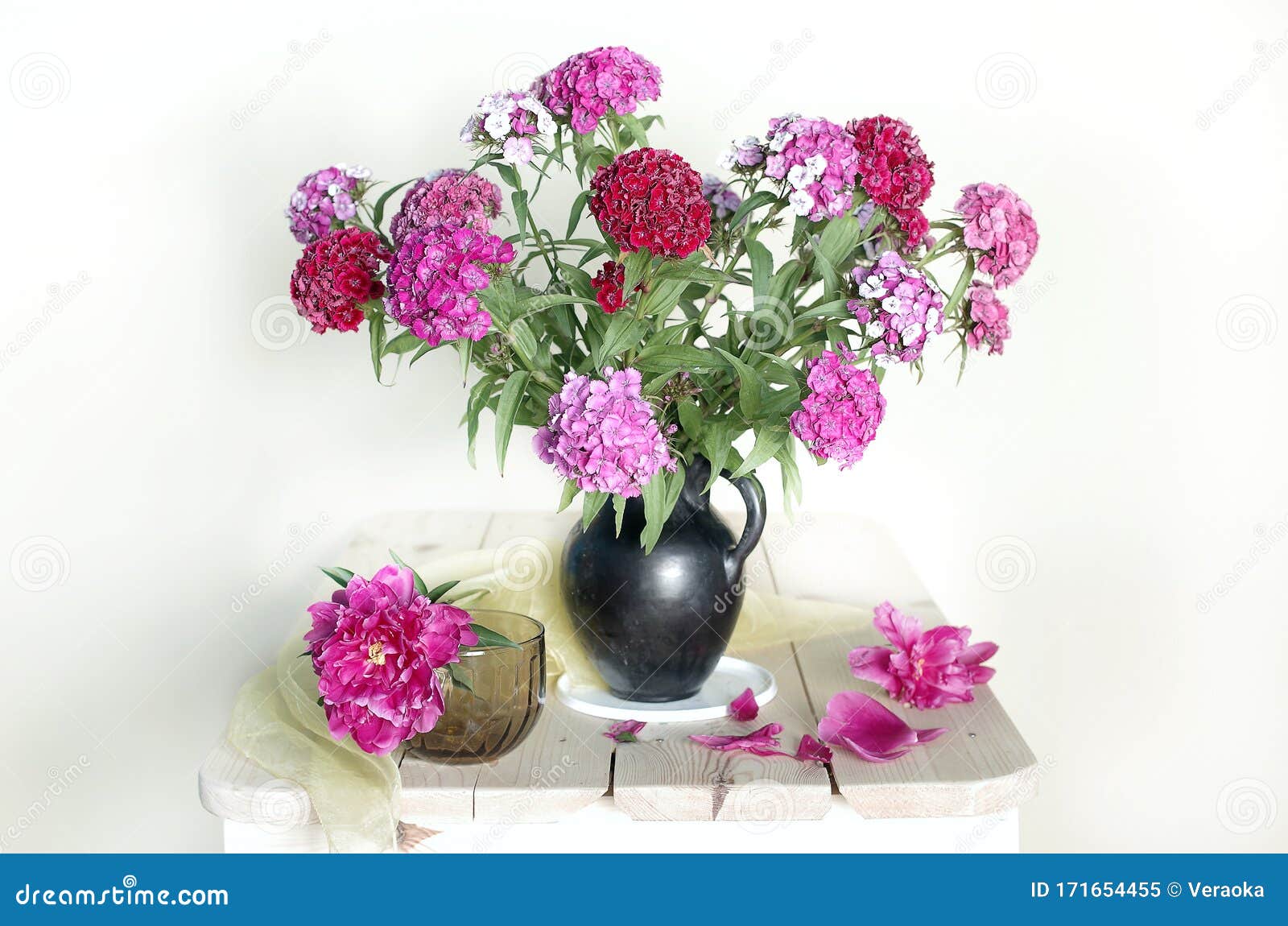 Beautiful Still Life with a Bouquet of Red Carnations in a Vase on the ...