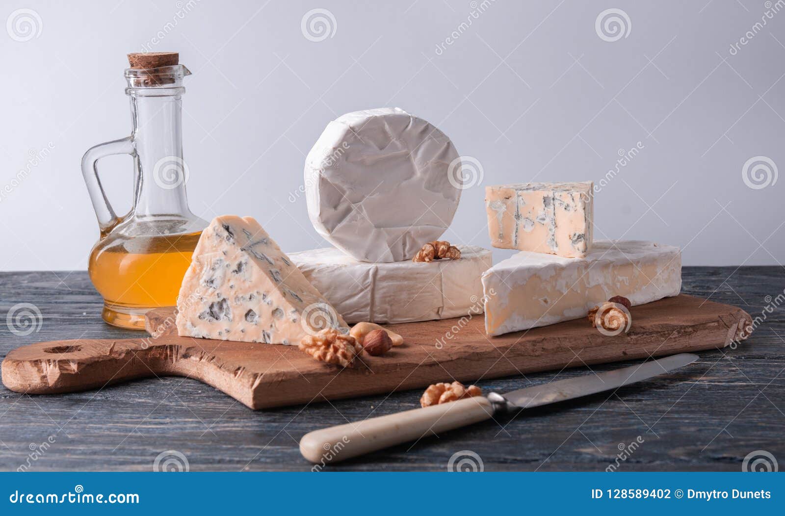 Still life with cheese. stock photo. Image of food, black - 128589402