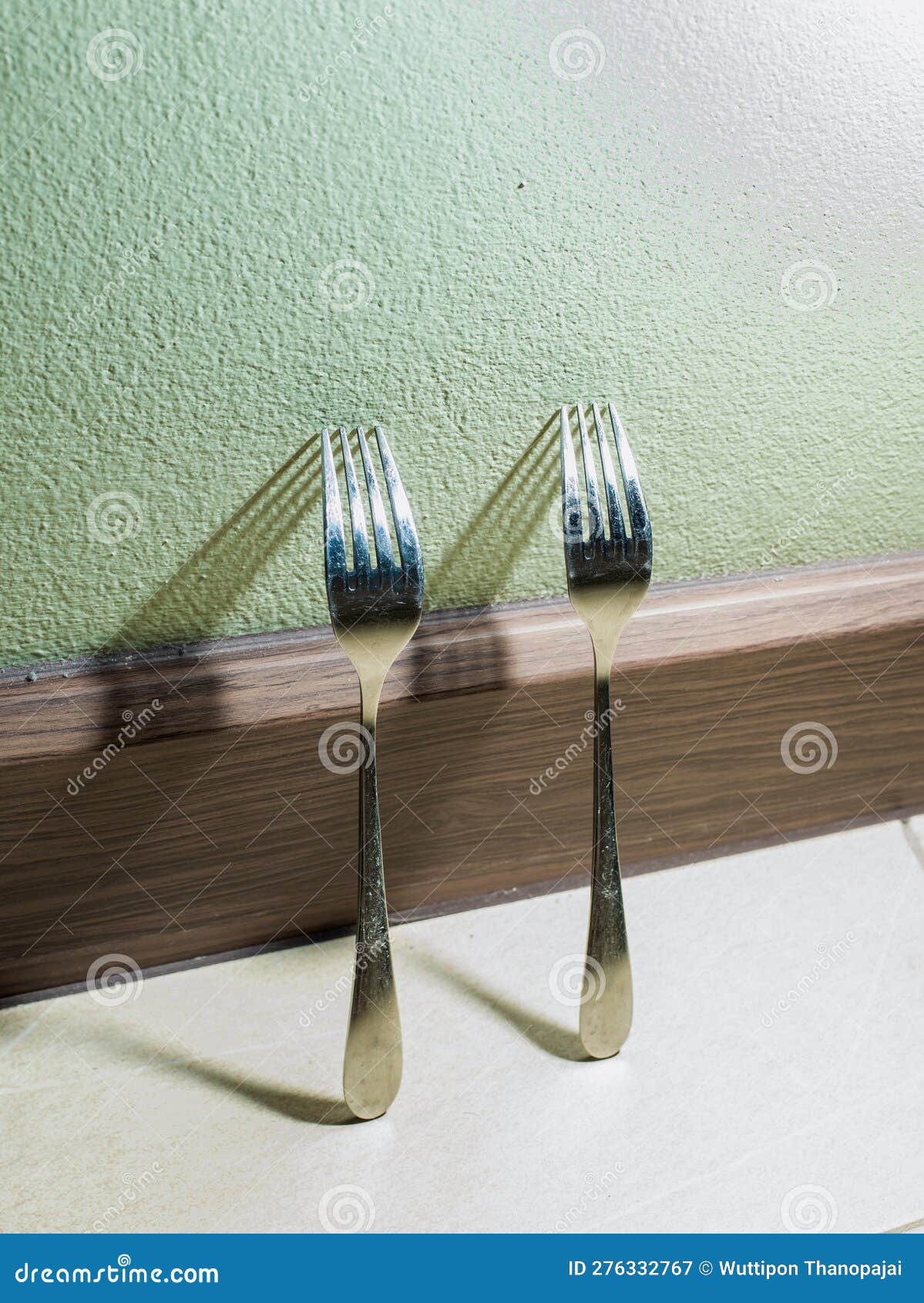 A Couple of Forks Stand on the Wall Stock Image - Image of textile ...