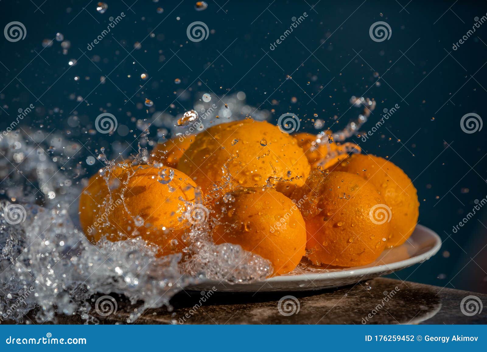 Still Life Eight Oranges on a Plate with Water Spray Stock Photo ...