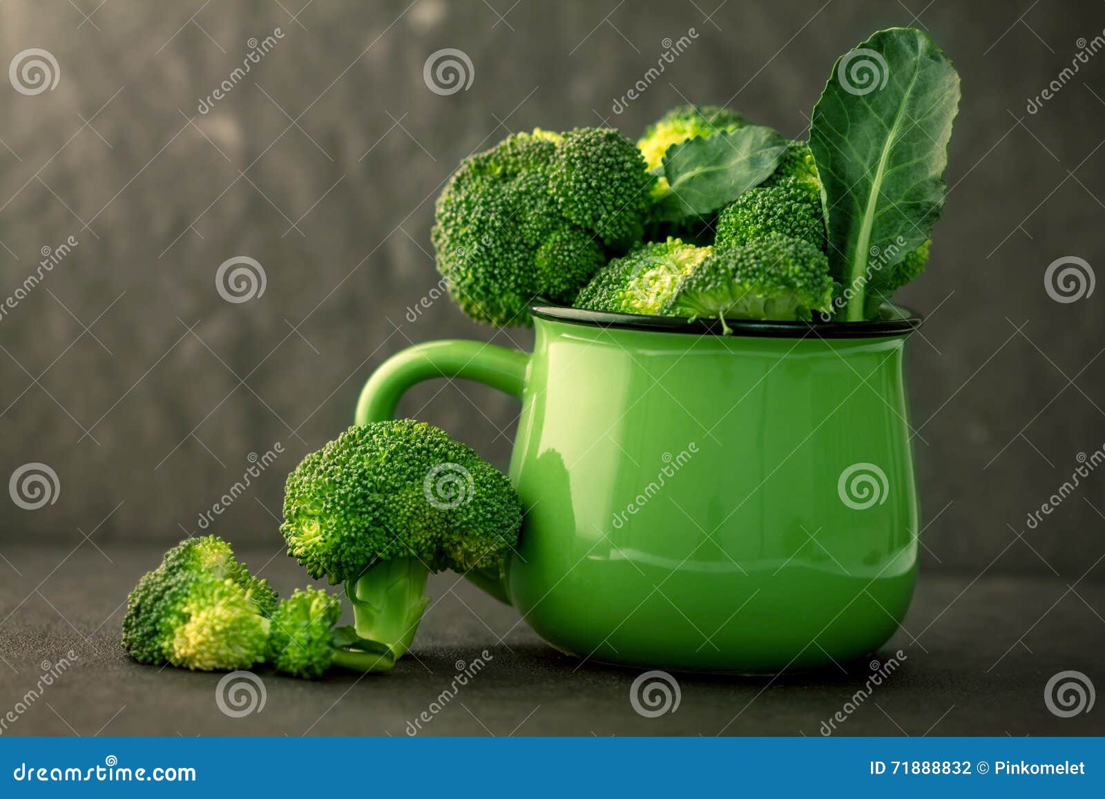 Still Life with Fresh Green Broccoli in Ceramic Cup on Black Stone ...