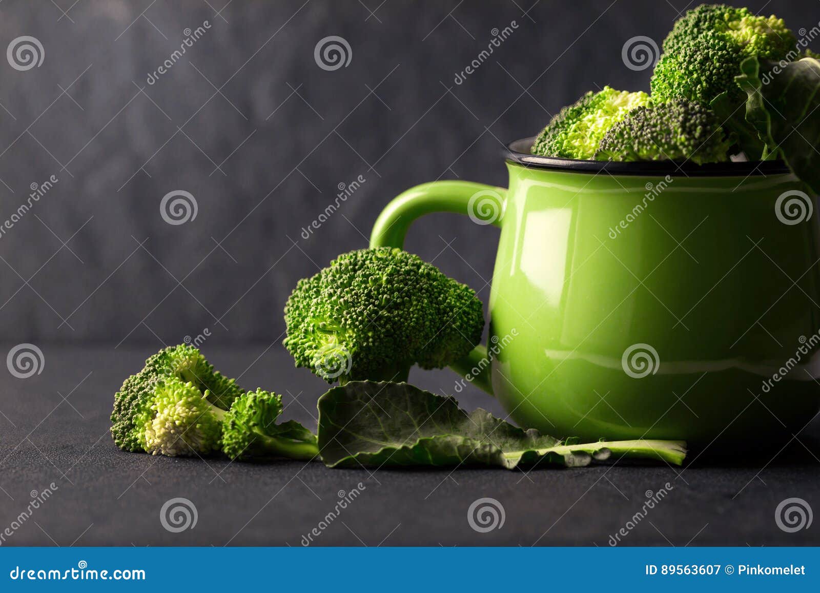 Still Life with Fresh Green Broccoli in Ceramic Cup on Black Stone ...