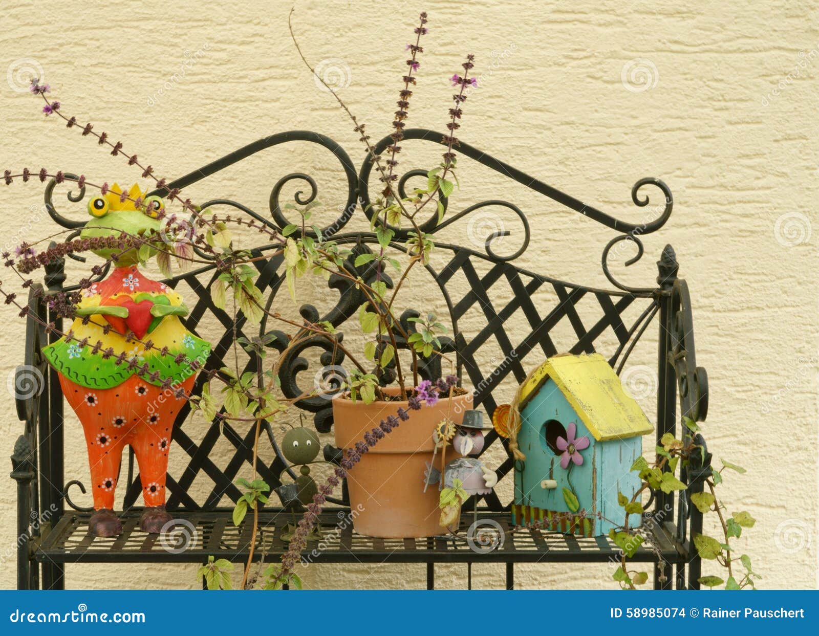 Still Life of a Frog, an Aviary, Some Flowers Stock Photo - Image of ...