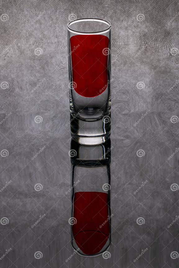 Still Life with Glass Objects with Colored Spots on a Reflective ...