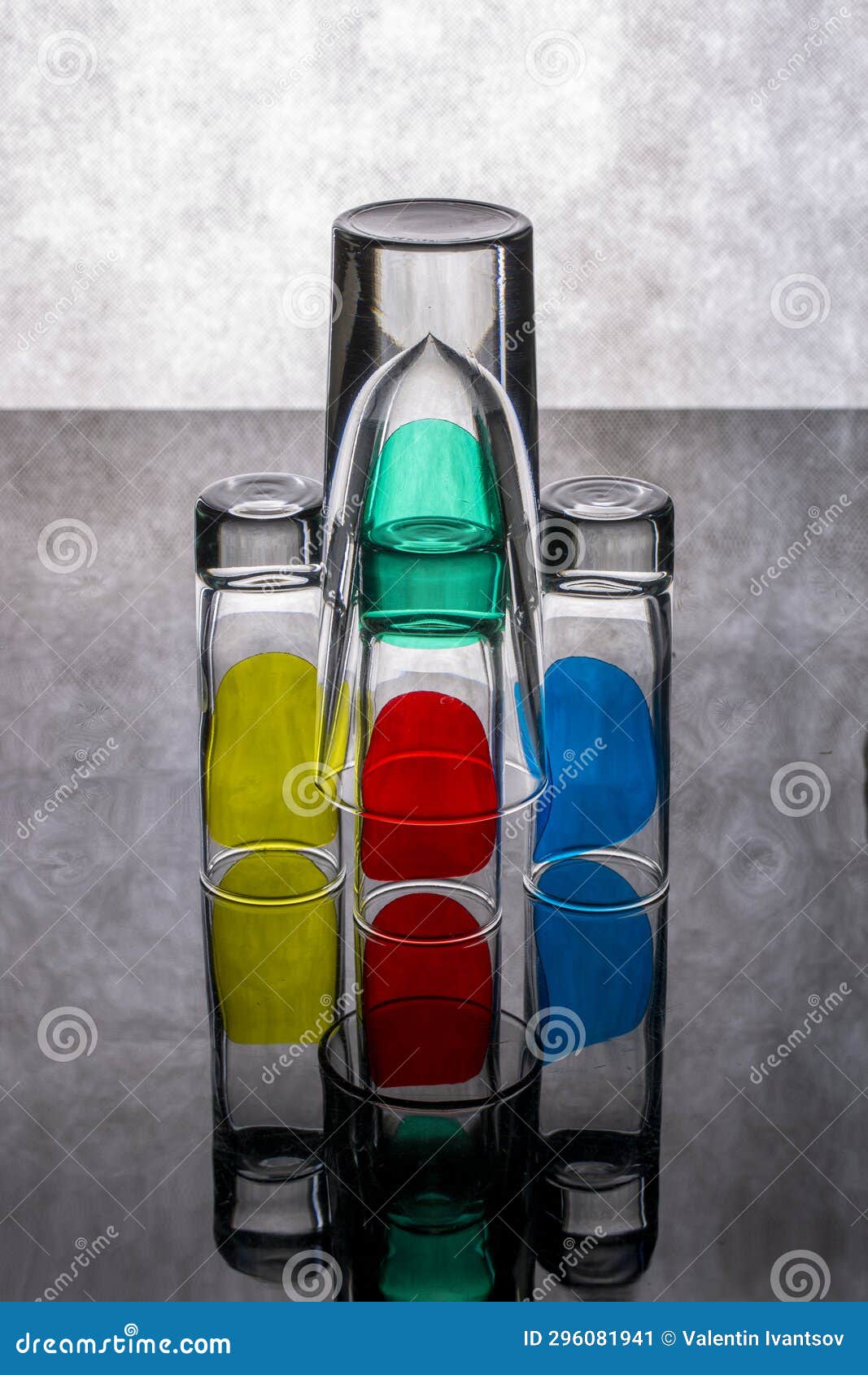 Still Life with Glass Objects with Colored Spots on a Reflective ...