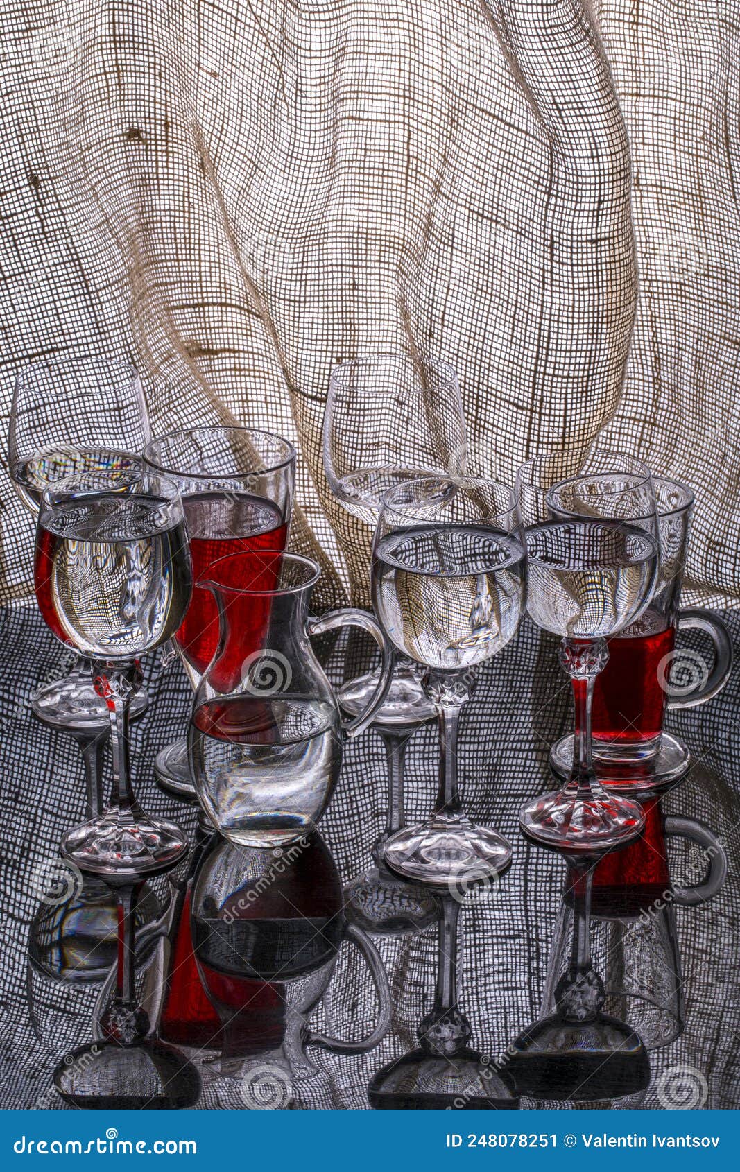 Still Life with Glasses with Liquid on the Reflective Surface Stock ...