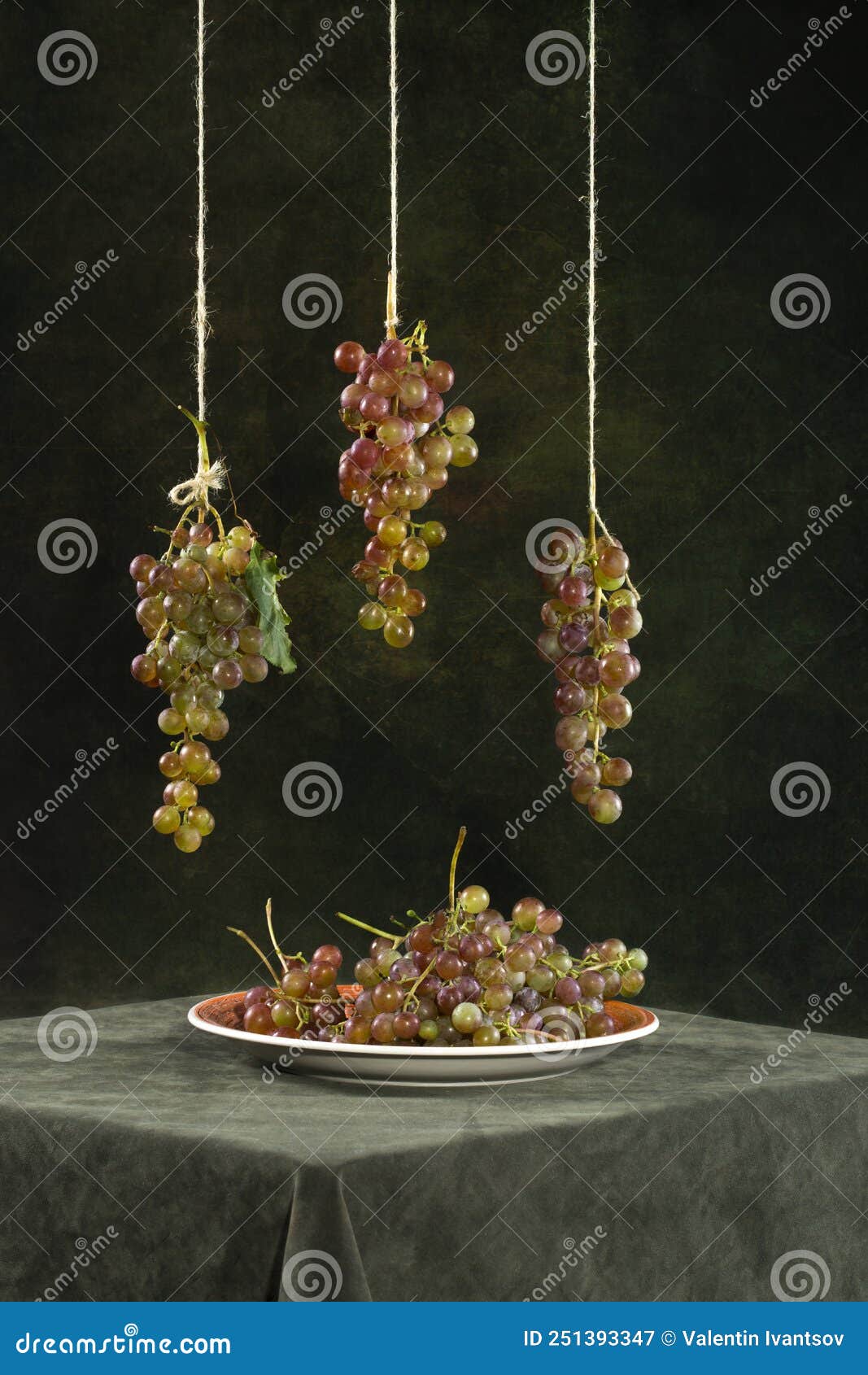 Still Life with Grapes in a Plate and a Bunch on a String Stock Image ...