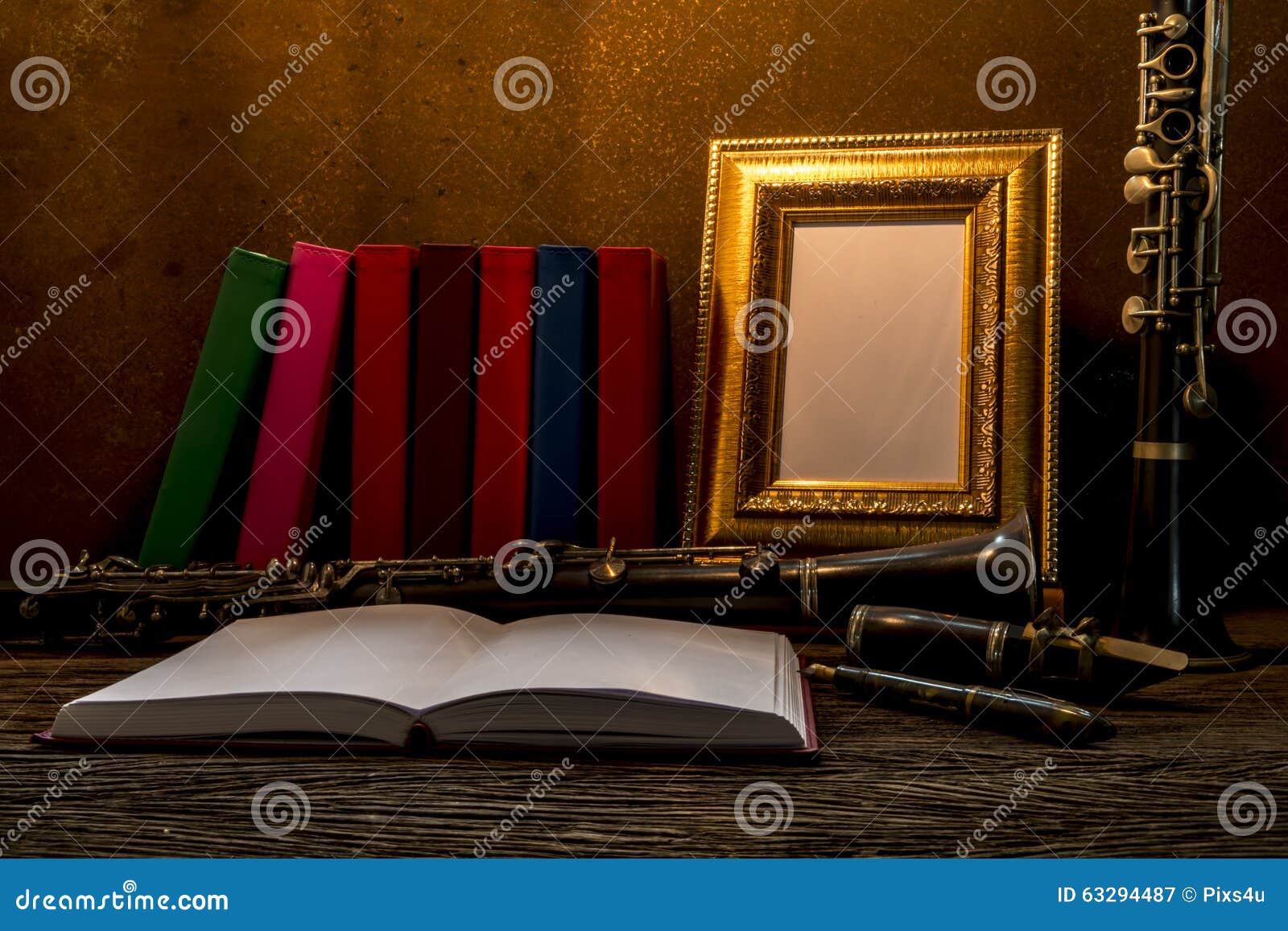 Still Life of Picture Frame on Wooden Table with Clarinet Stock Image ...