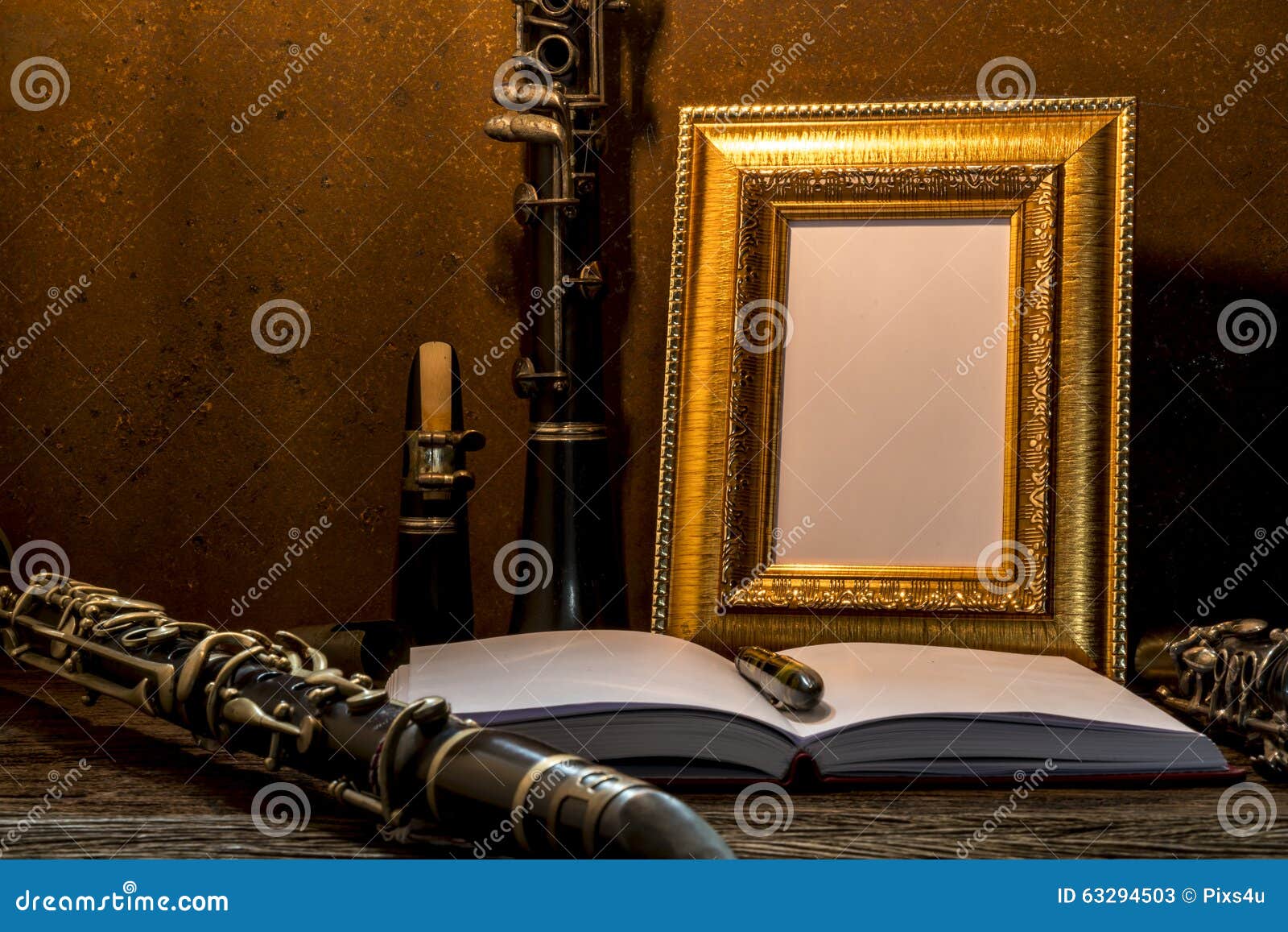 Still Life of Picture Frame on Wooden Table with Clarinet Stock Image ...