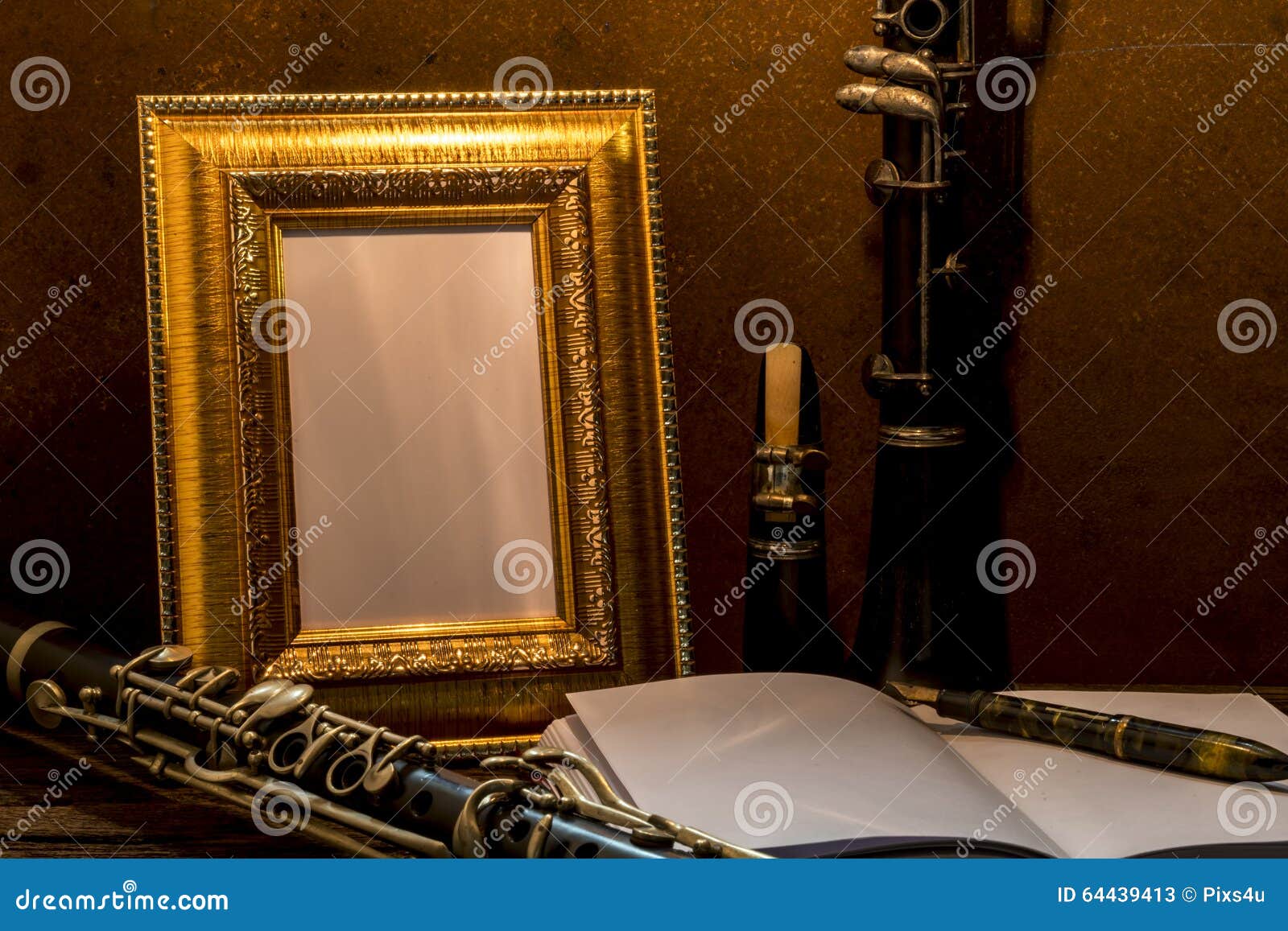 Still Life of Picture Frame on Wooden Table with Clarinet Stock Image ...