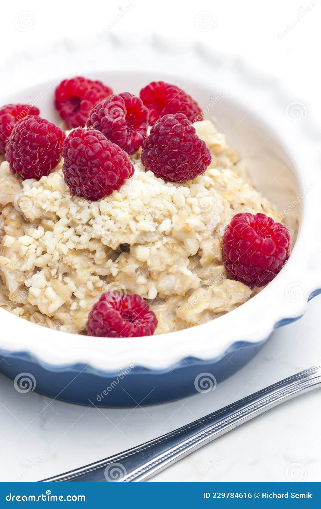 Still Life of Porridge with Raspberries Stock Photo - Image of bowl ...