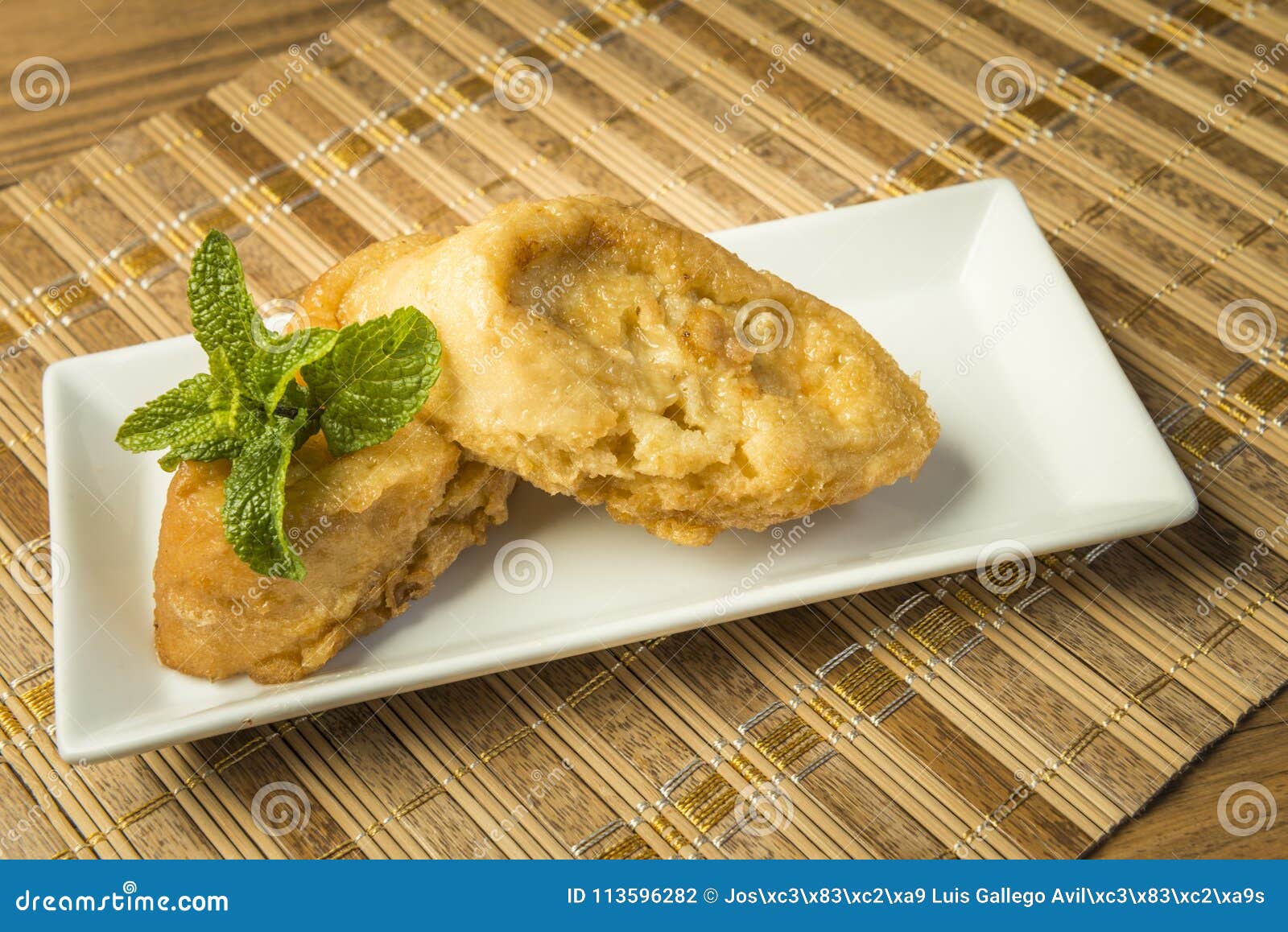 French Toast in a Rectangular Dish on a Bamboo Mat Stock Photo - Image ...