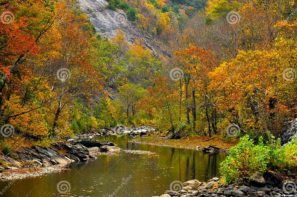 Still river in fall colors stock photo. Image of fall - 23648604
