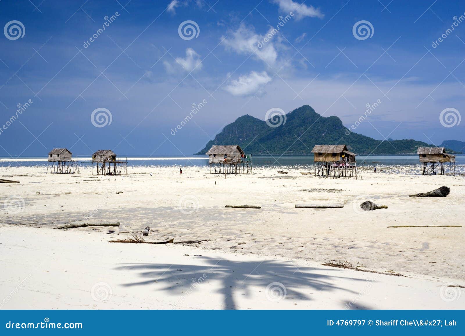 Stilt Huts on Tropical Beach Stock Image - Image of beach, picturesque ...