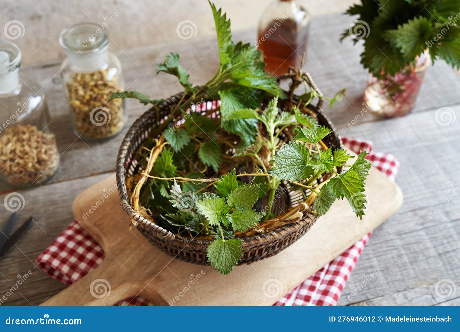 Stinging Nettles with Roots in a Basket on a Table Stock Photo - Image ...