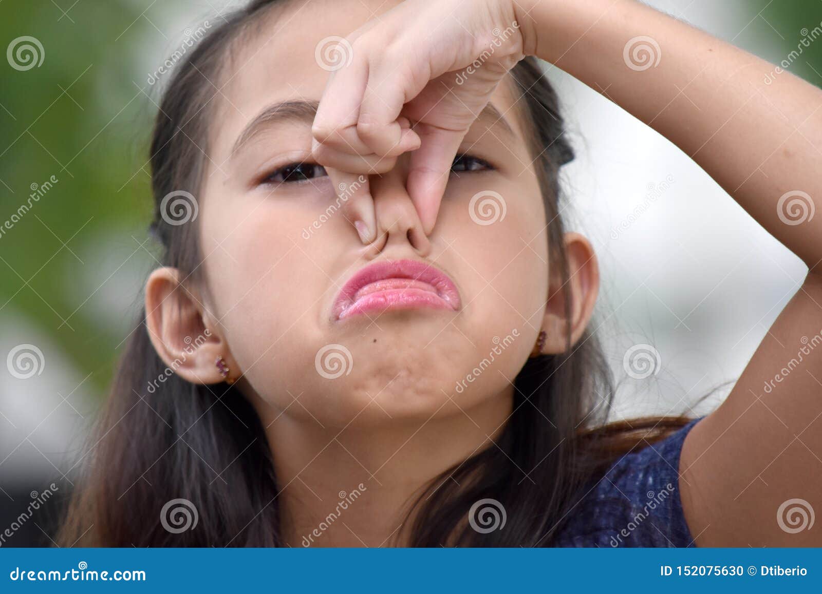 A Stinky Youthful Girl stock photo. Image of smell, childhood - 152075630