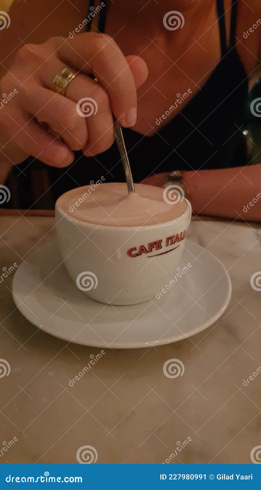 Stir in Coffee in a White Coffee Mug Using Right Hand Stock Image ...