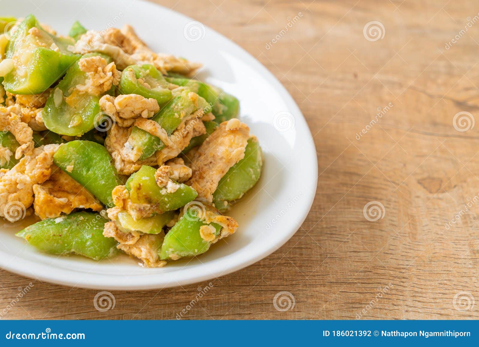 Stir Fried Angled Gourd with Egg Stock Photo - Image of cylindrica ...