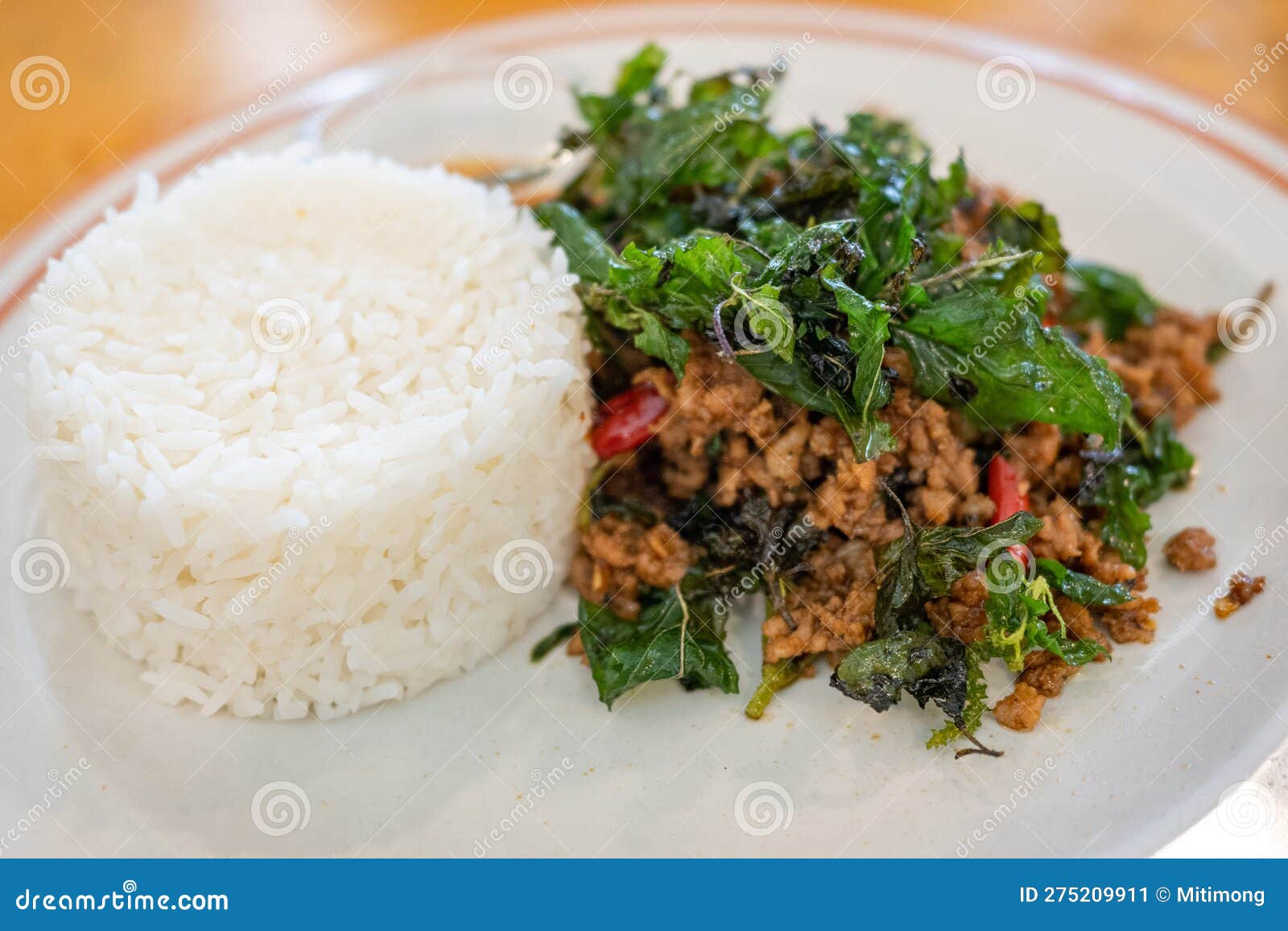 Stir Fried Basil with Pork and Century Eggs on Rice Stock Image - Image ...