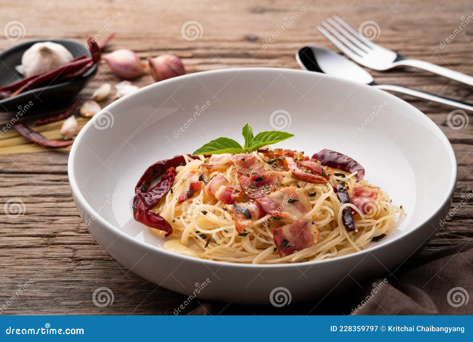 Stir Fried Capellini Pasta With Dried Chili And Crispy Bacon On White Plate Stock Image Image