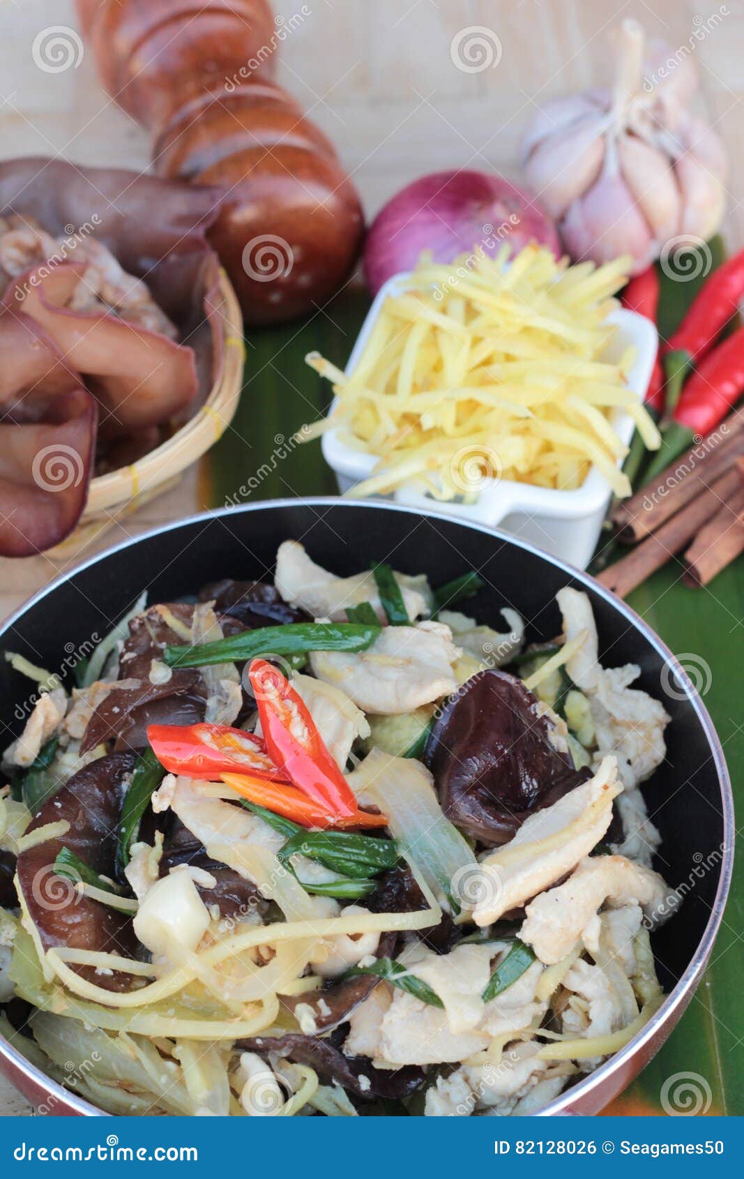 Stir Fried Chicken, Ginger and Fresh Ginger Sliced. Stock Photo - Image ...