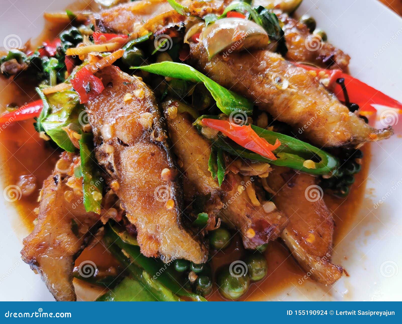 Stir Fried Chilli Paste of Deep Fried Redtail Catfish Stock Photo ...