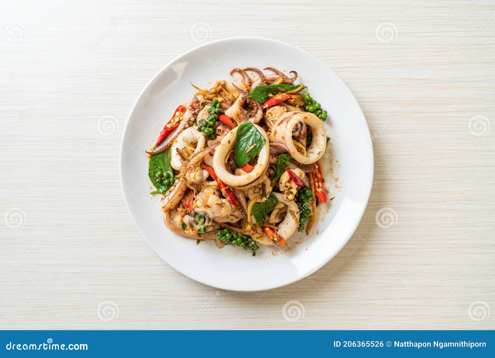 Stir Fried Holy Basil with Octopus or Squid and Herb Stock Photo ...
