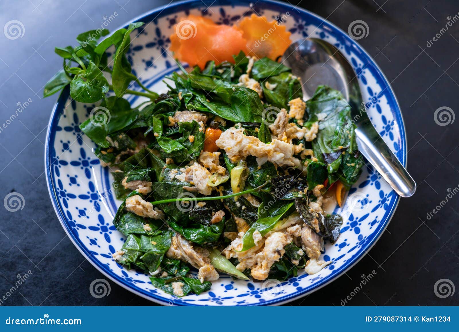 Stir Fried Melinjo Leaves with Egg - Bai Lieng Pad Kai Stock Photo ...