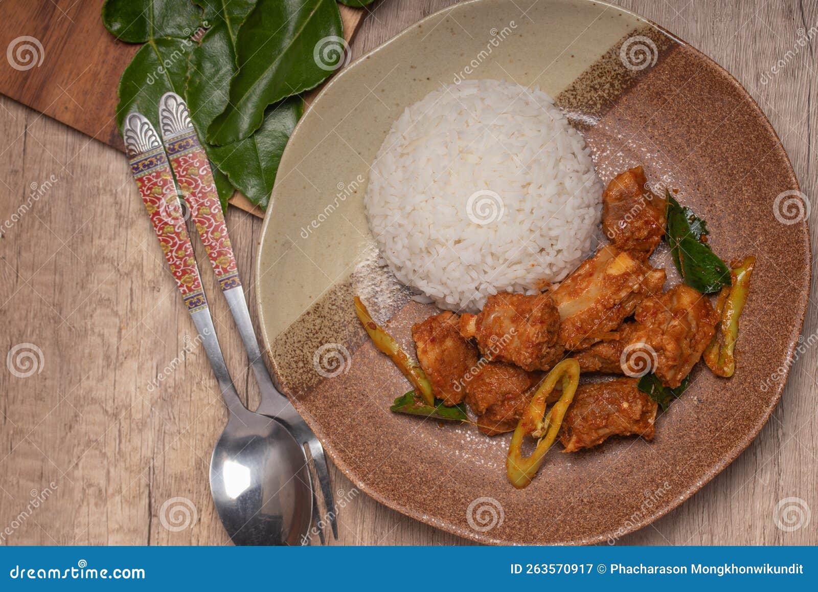 Stir-fried Pork Ribs with Curry Paste and Steamed Rice Stock Image ...