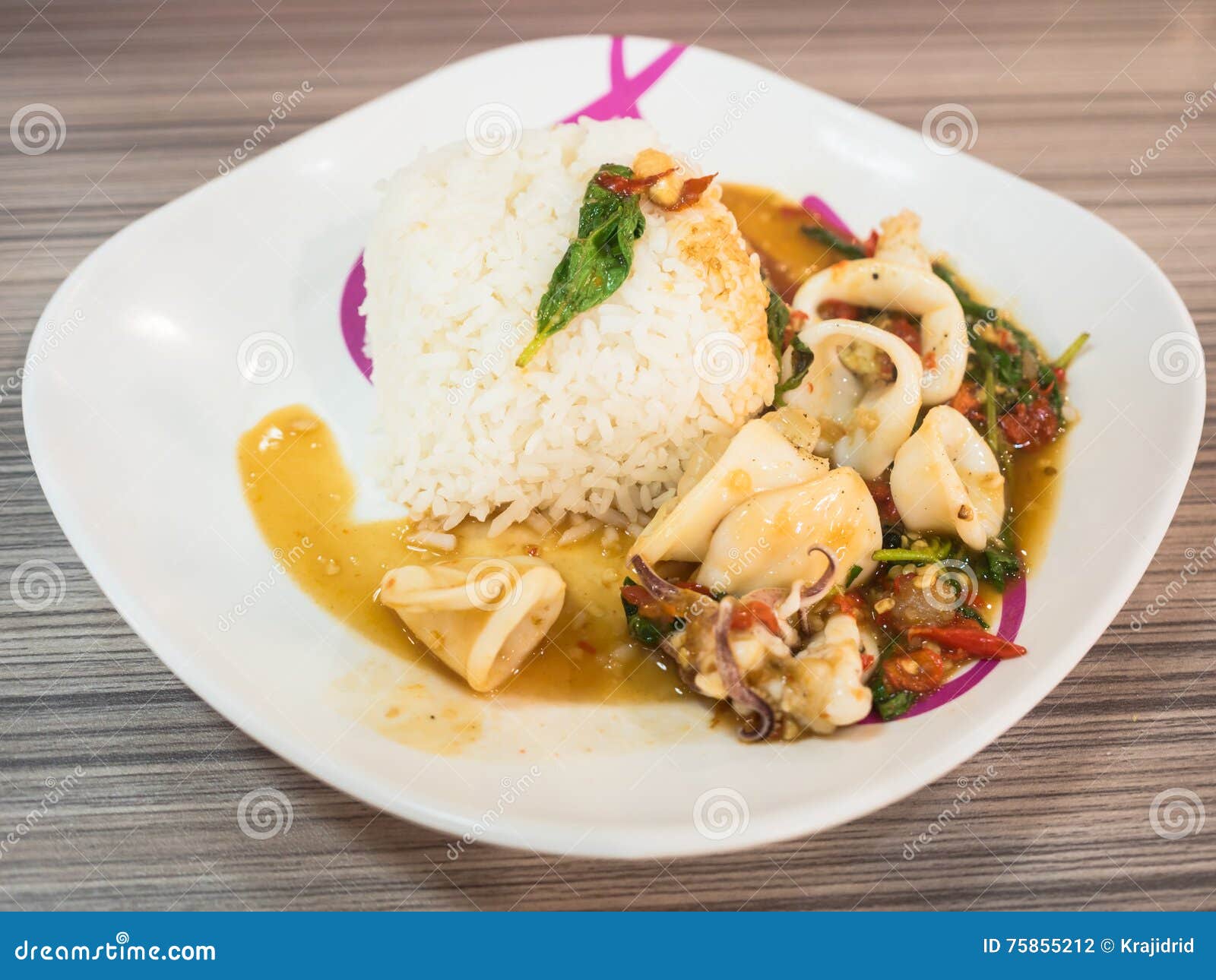 Stir-fried Squid with Holy Basil Stock Photo - Image of onion, food ...