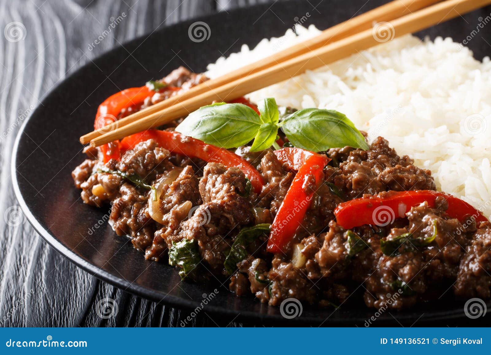 Stir-fried Thai Pad Gra Prow with Rice Side Dish Close-up on a Plate ...