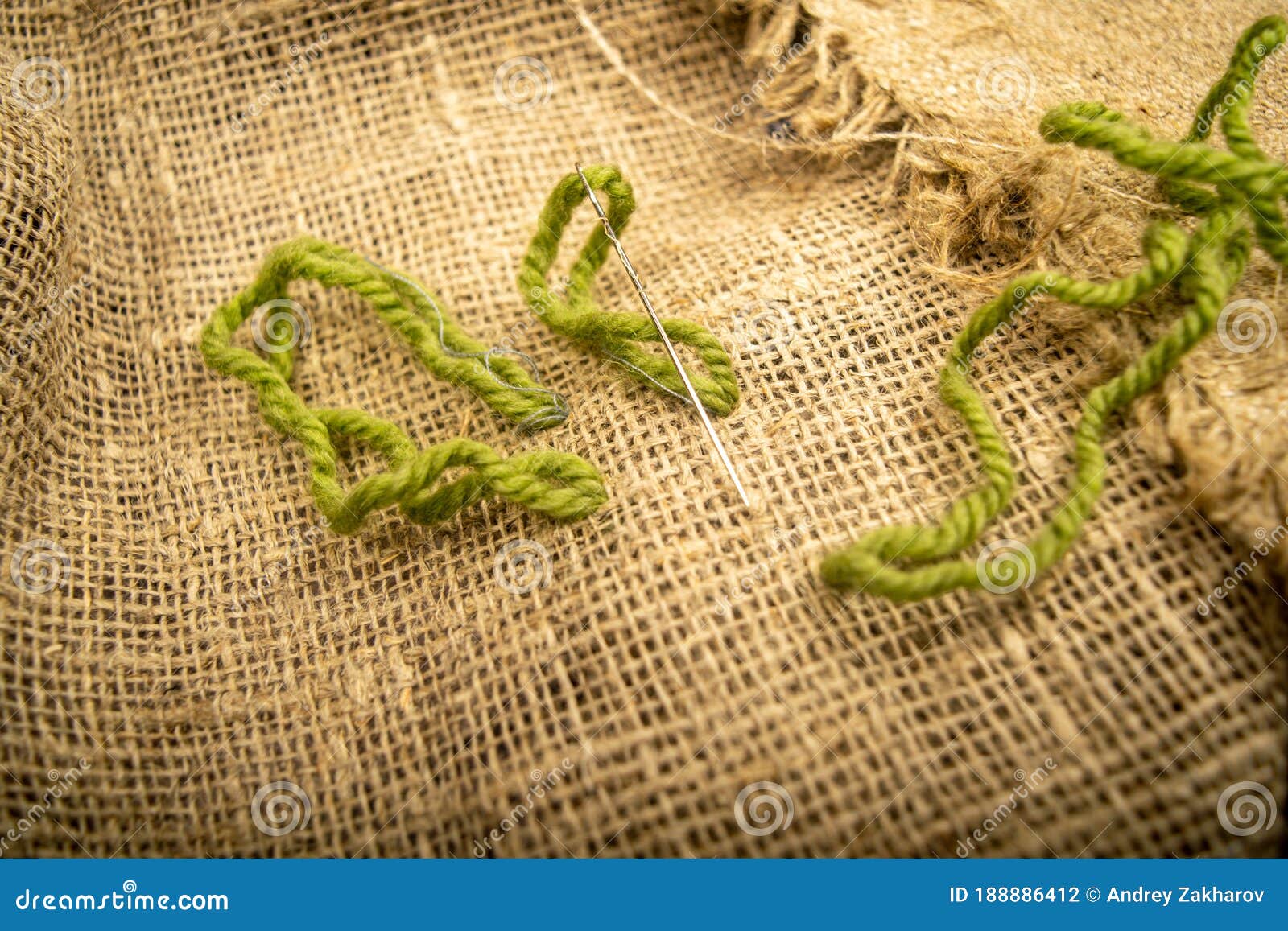 Stitches of Green Thread on the Burlap with a Rough Texture. Close Up ...