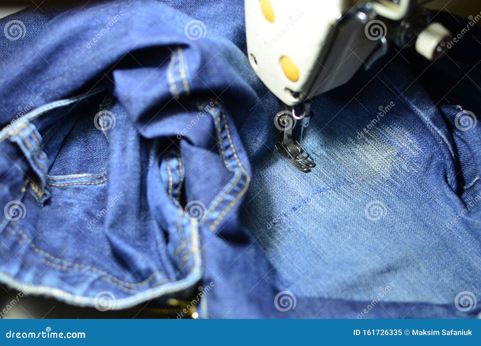 Stitching, Stitching a Hole in Blue Jeans with a Sewing Machine. Part ...