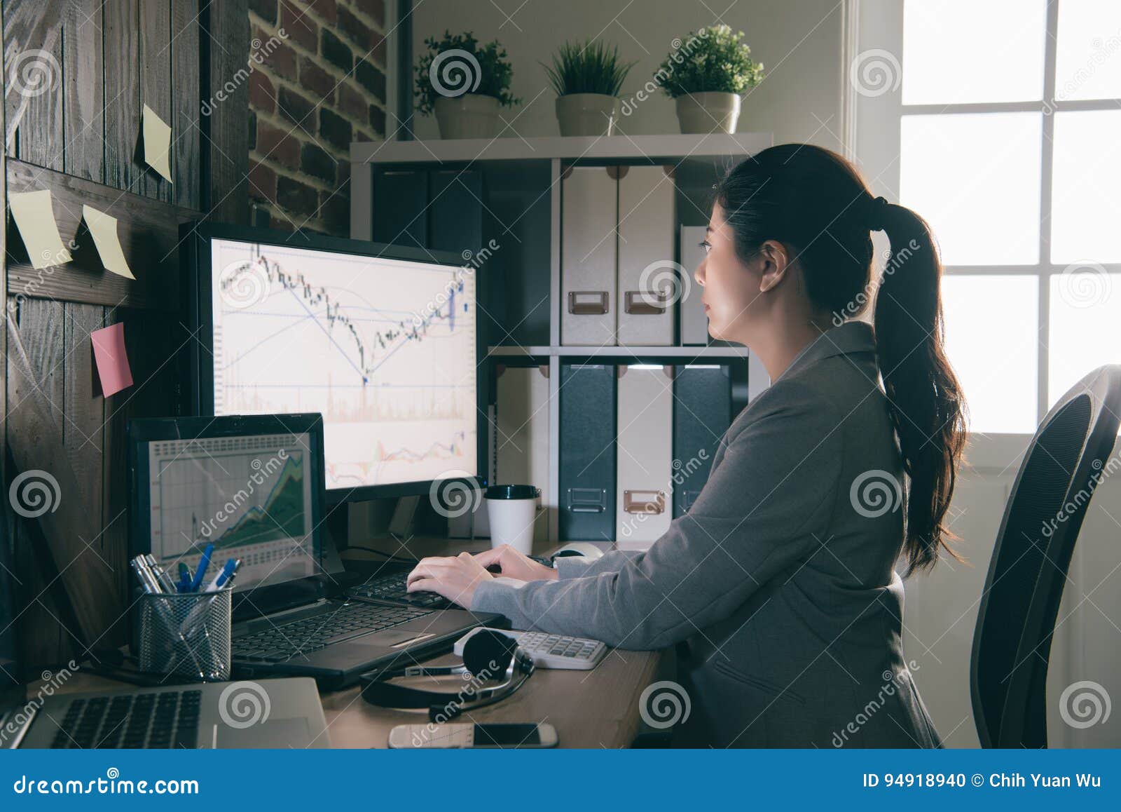 Stock Analysts Sitting in Front of Computer Stock Photo - Image of ...