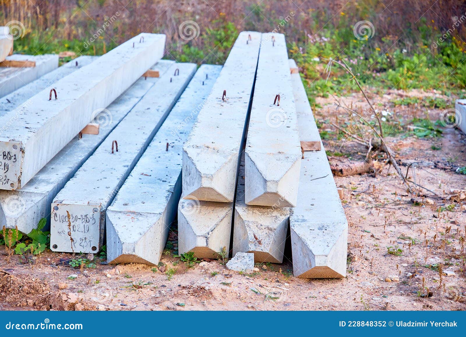 Stock of Concrete Piles at the Construction Site. Concrete Driven Piles ...