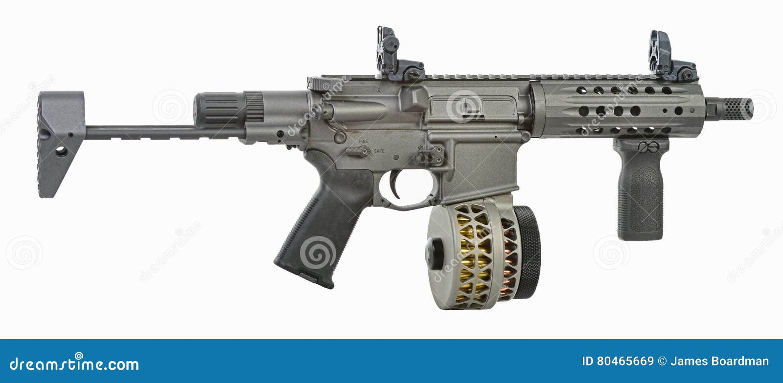 An Extended Pistol Magazine Out Of The Grip Of A Black Semi Automatic ...