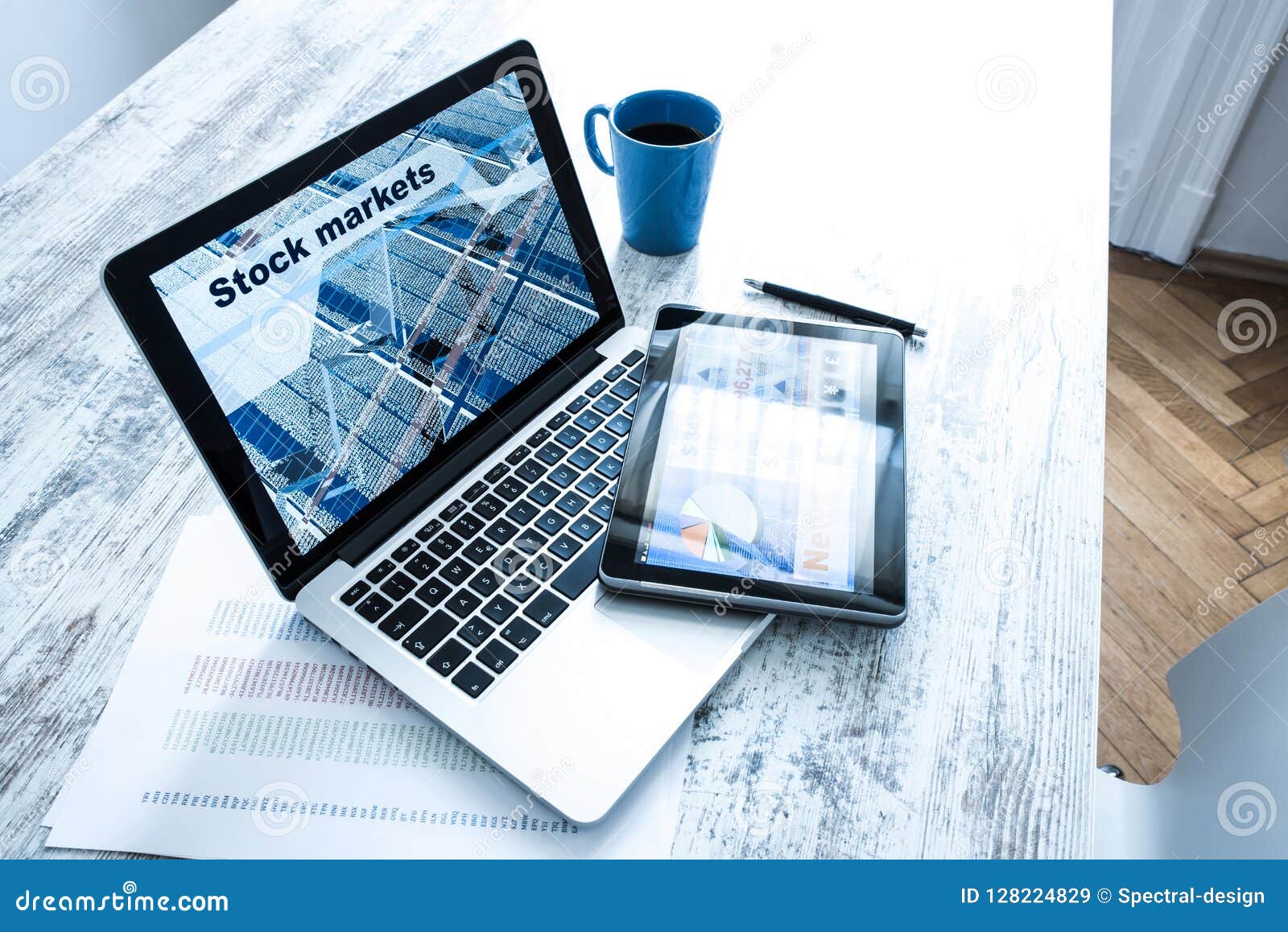 Stock Market Trading App on a Tablet PC and Laptop PC Stock Image ...