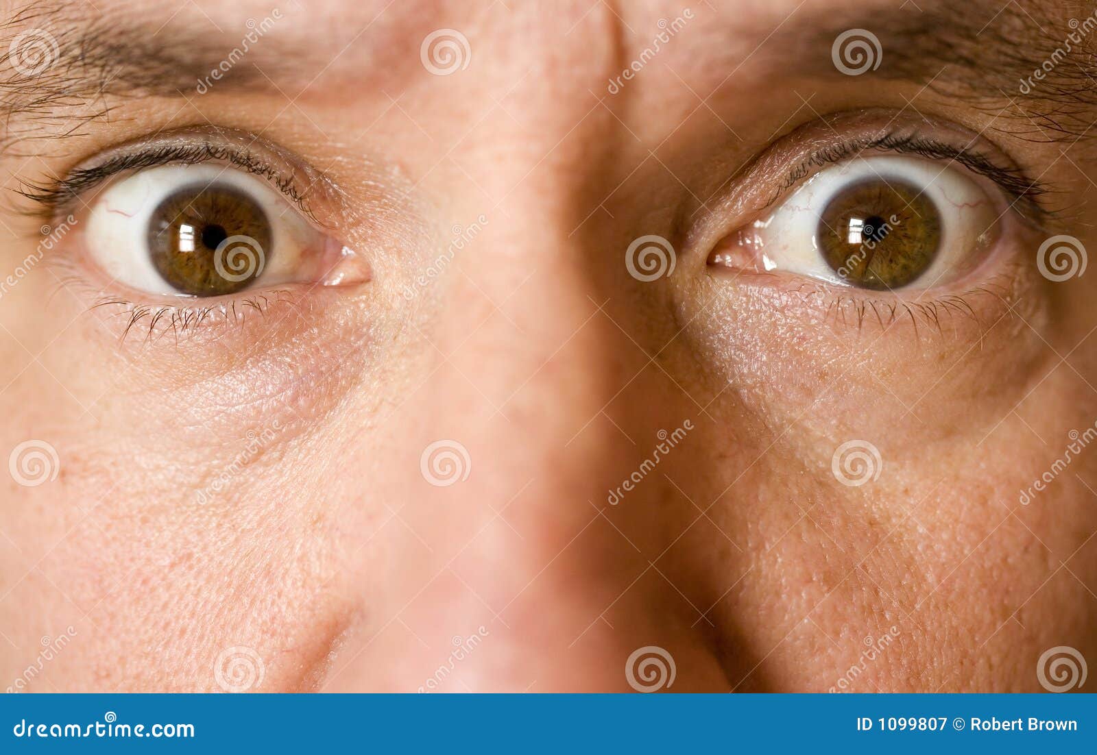 Stock Photo of the Eyes of a Surprised Man Stock Image - Image of ...