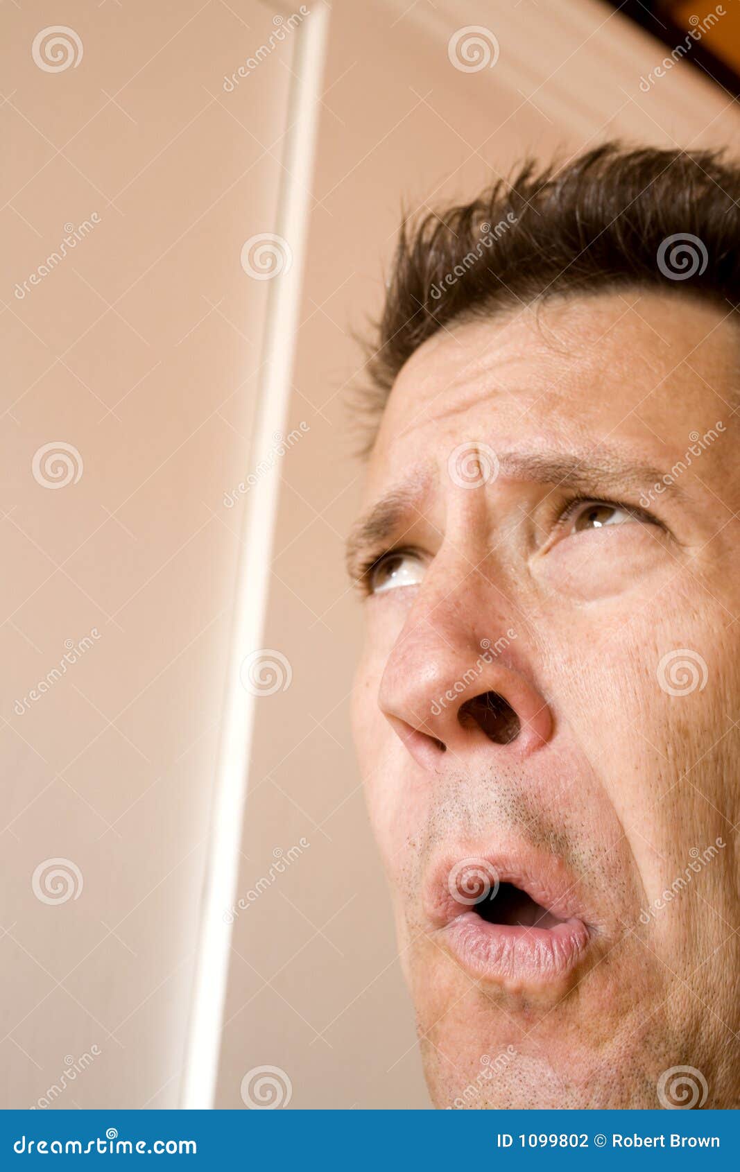 Stock Photo of a Man Making a Funny Face Stock Photo - Image of squint ...